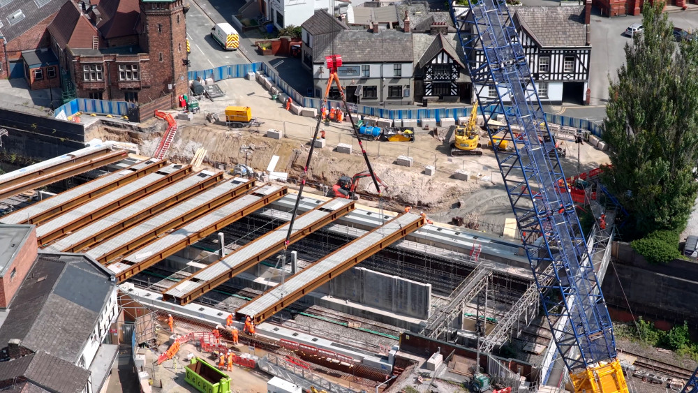 New bridge beams lowered into place on Greek Street as Stockport railway network gets ready to ...